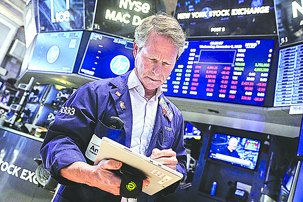 Wall Street gains ground amid steady flow of earnings reports and ...